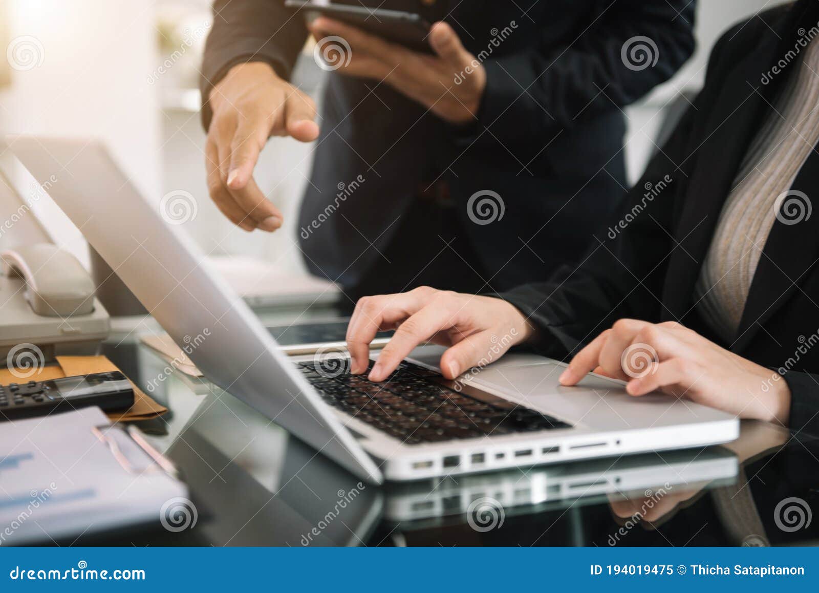 Business Documents on Office Table with Smart Phone, Tablet and Laptop ...