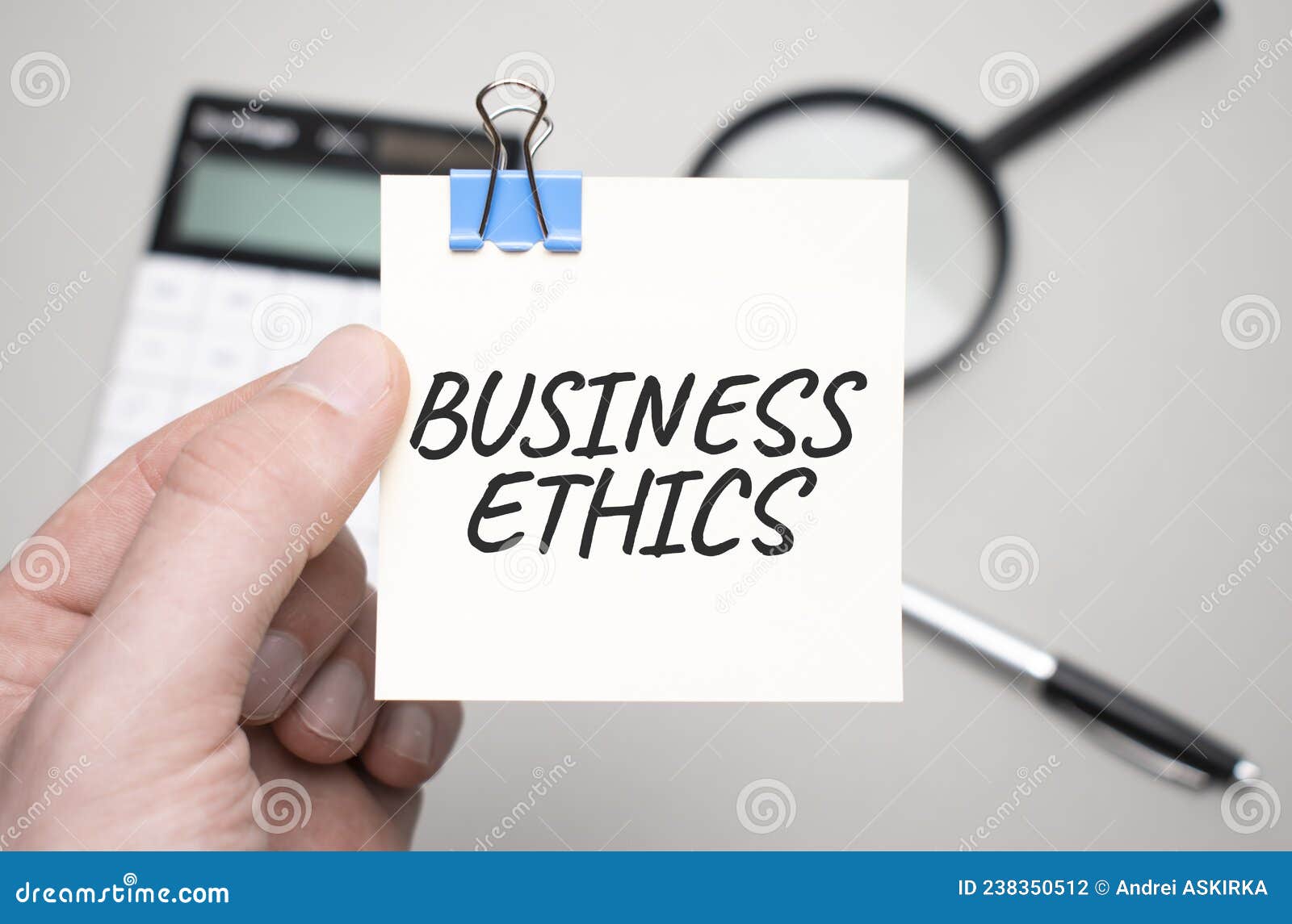Business Ethics Card Isolated on White Backgroundd and White Calculator ...