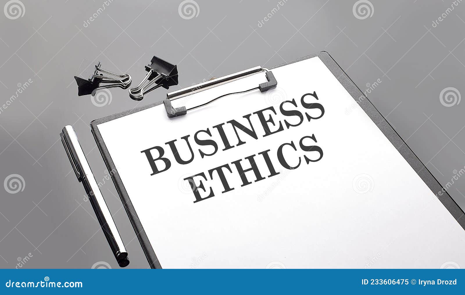 BUSINESS ETHICS Text on White Paper Sheet on Black Background Stock ...