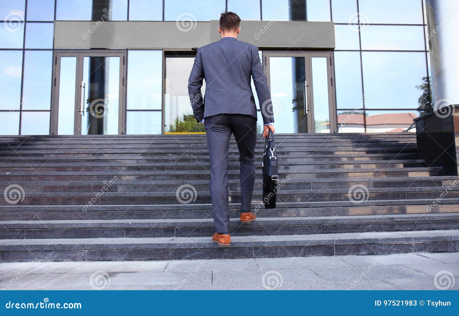 Business Executive with Briefcase Going Up the Stairs. Stock Image ...