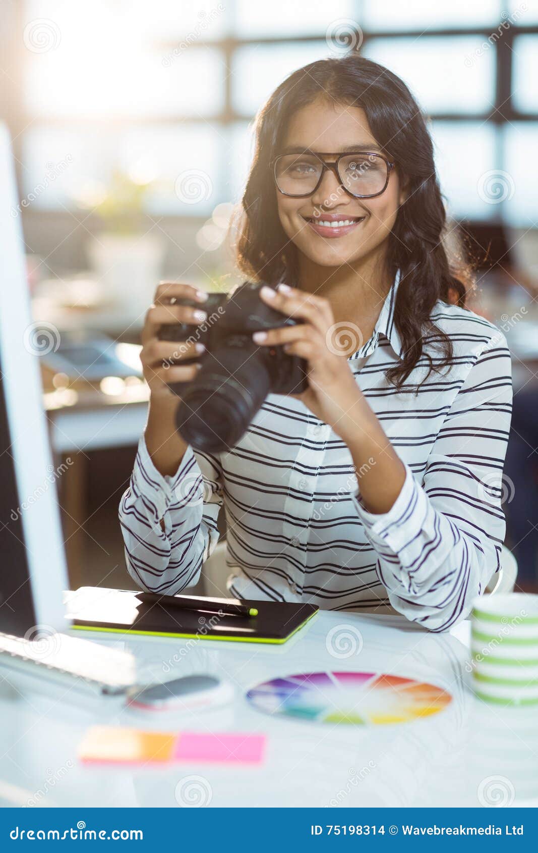 Business Executive Checking Photos in Camera Stock Photo - Image of ...