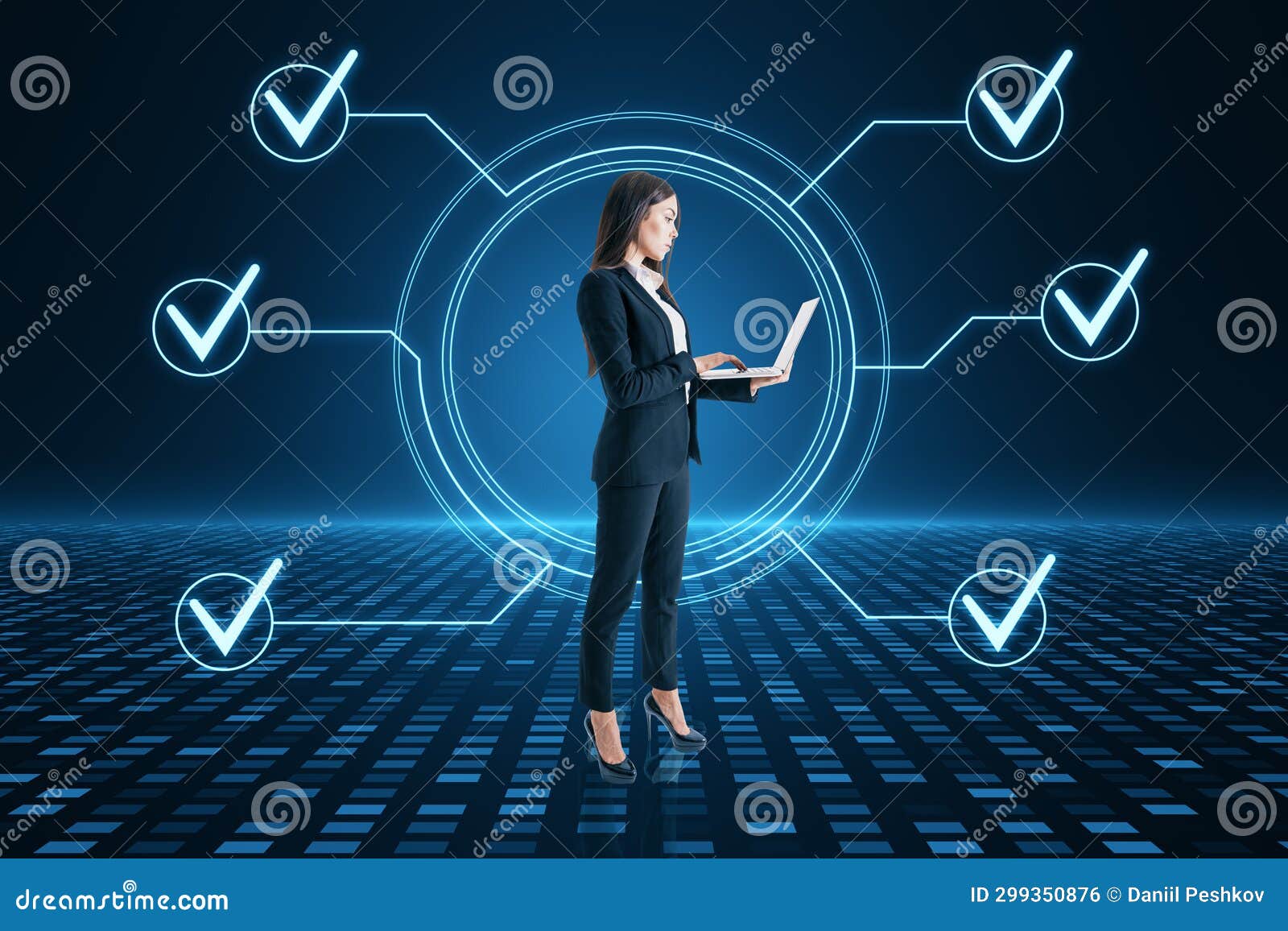 Business Executive with Laptop Analyzing Virtual Check Marks in a ...