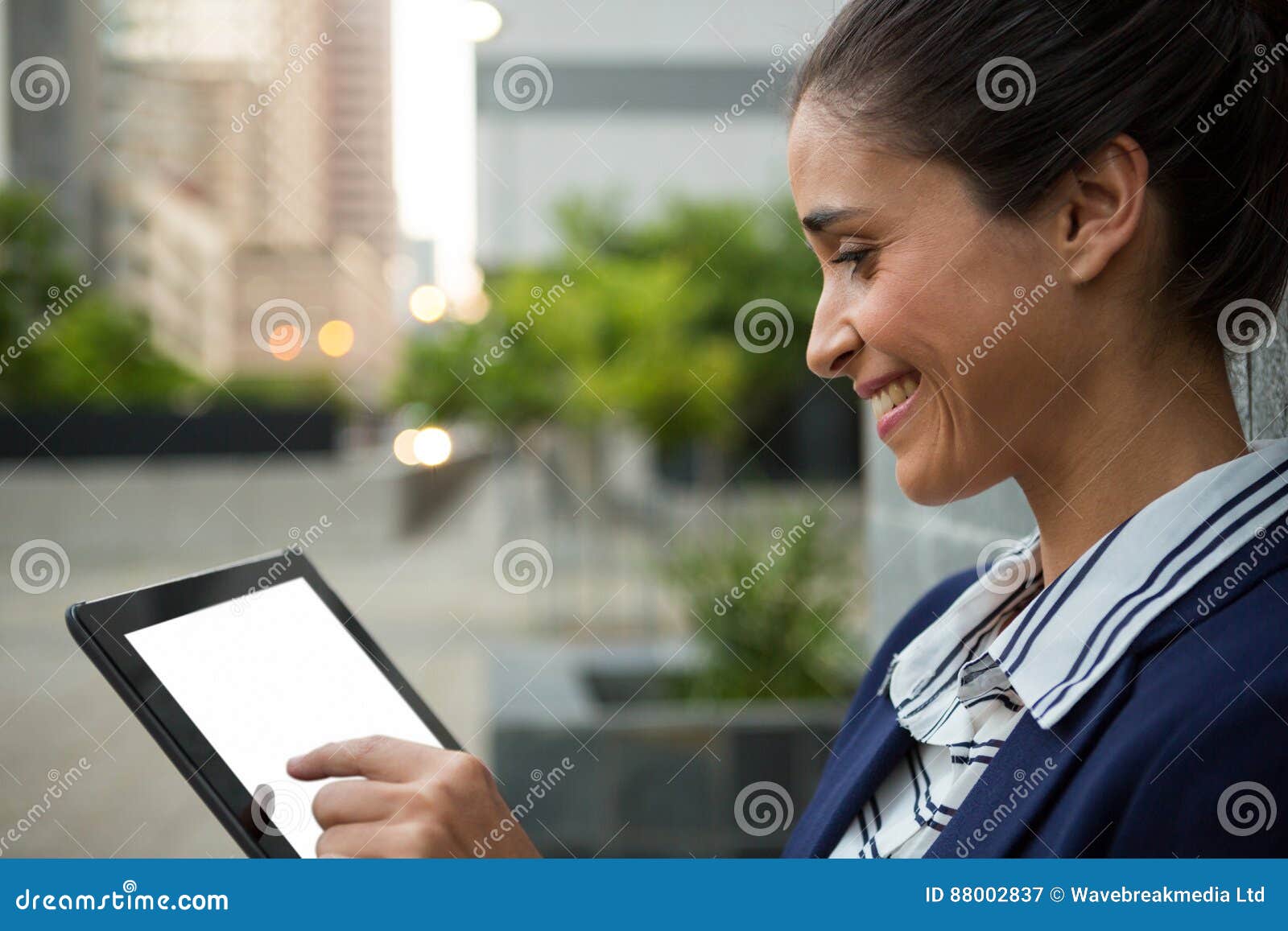 Business Executive Using Digital TabletBusiness Executive Using Digital ... Business Executive Using Digital TabletBusiness Executive Using Digital ...