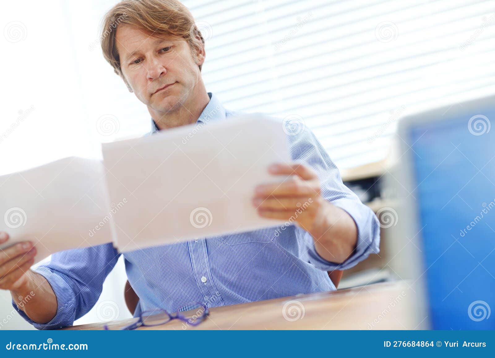 These Business Figures Look Accurate. Mature Male Business Associate ...