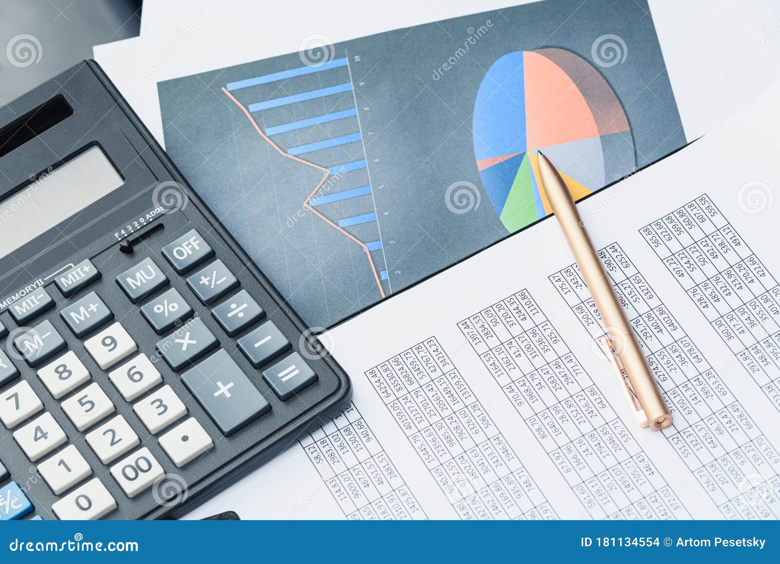 Business Financial Documents, Office Calculator and Pen on the Table ...