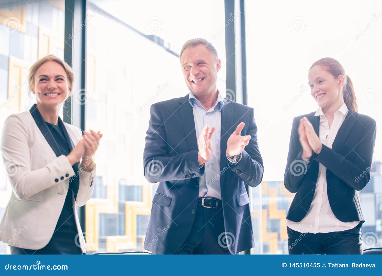 Business Group Clapping and Smiling Stock Image - Image of employees ...