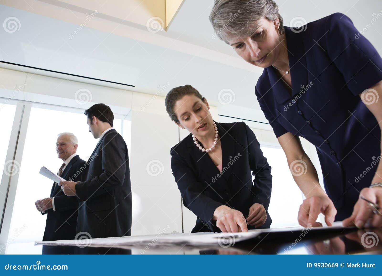 Business Group Conferrring Over Company Strategy. Stock Image - Image ...