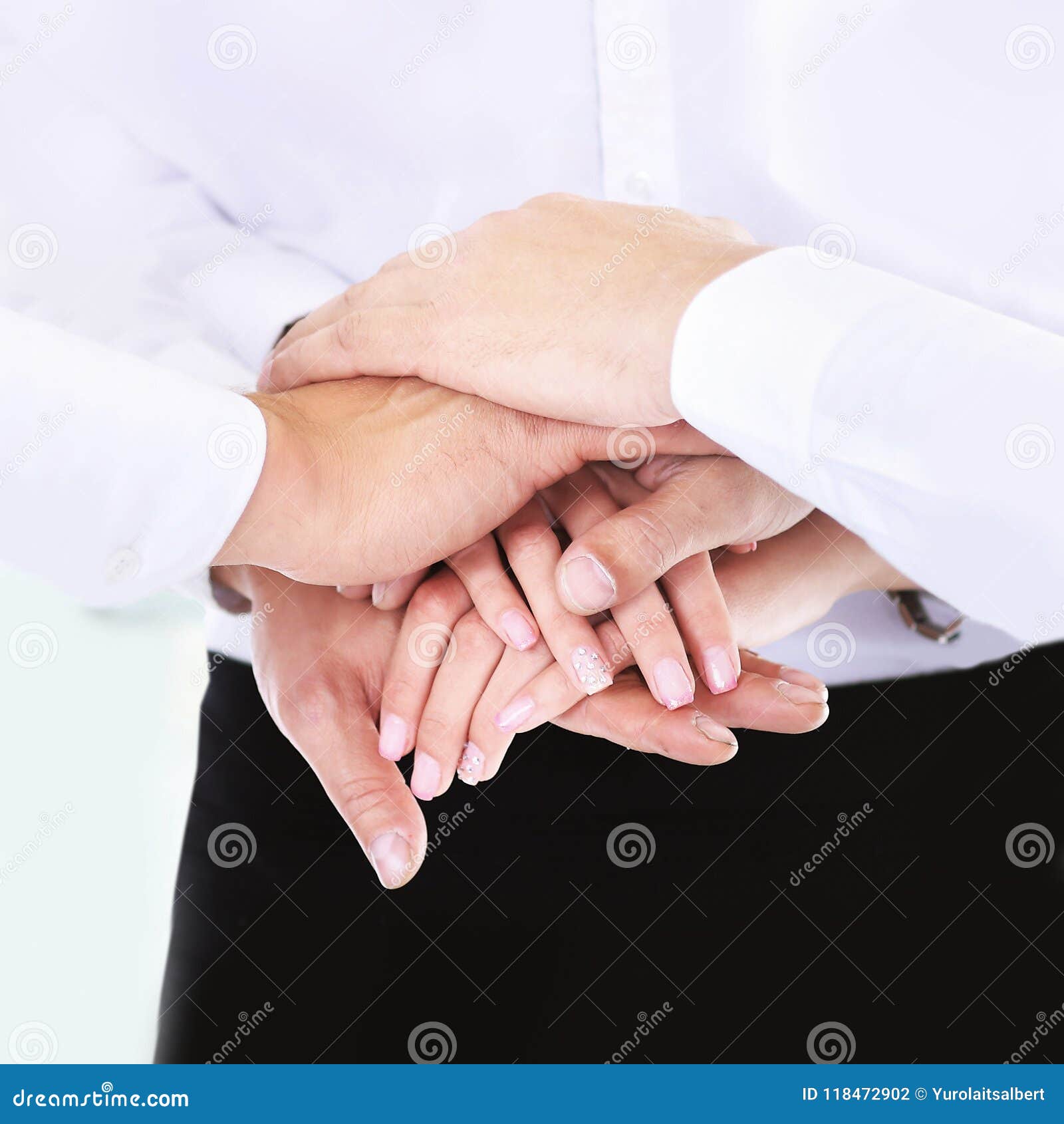 Business Group with Hands Folded in a Pyramid Together-collaborative ...