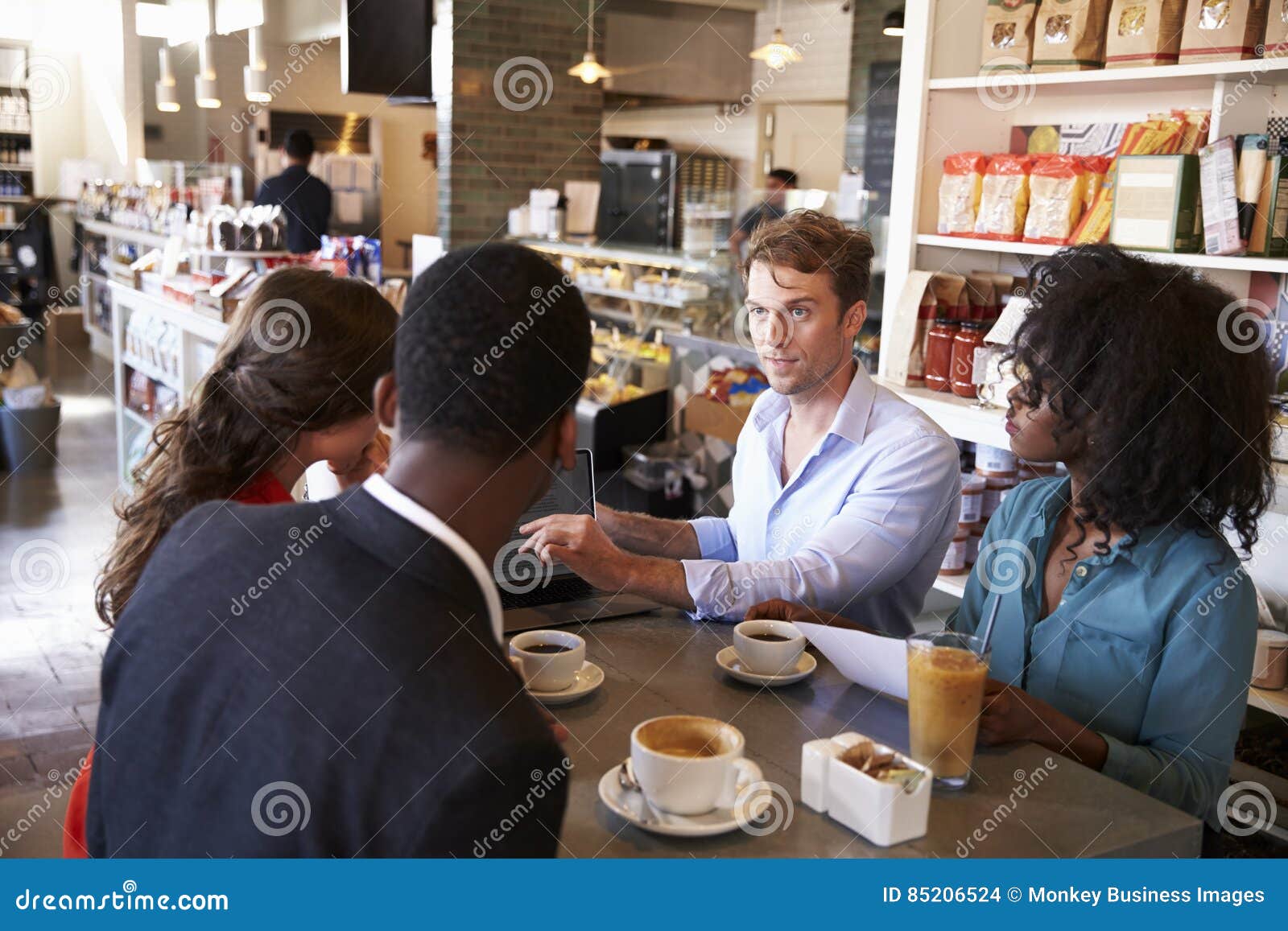 Business Group Having Informal Meeting in Cafe Stock Photo - Image of ...