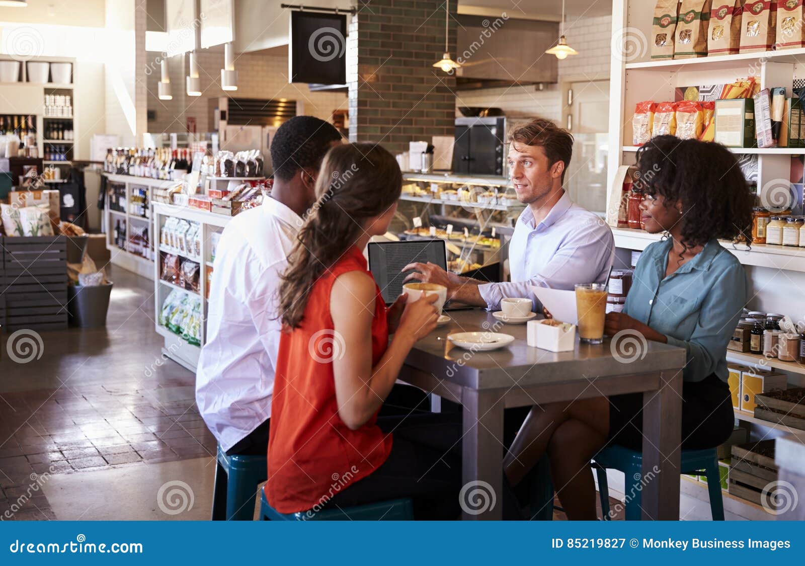 Business Group Having Informal Meeting in Cafe Stock Image - Image of ...
