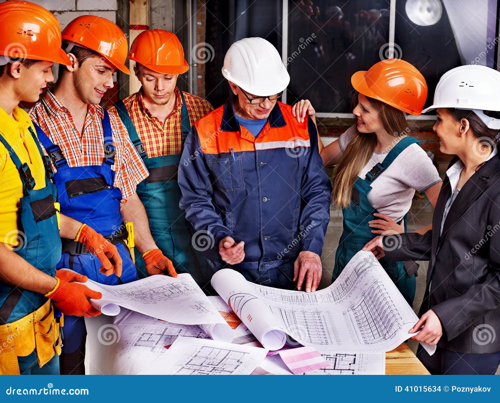 Builder In Helmet Waits While Woman With Busy Face Royalty-Free Stock ...