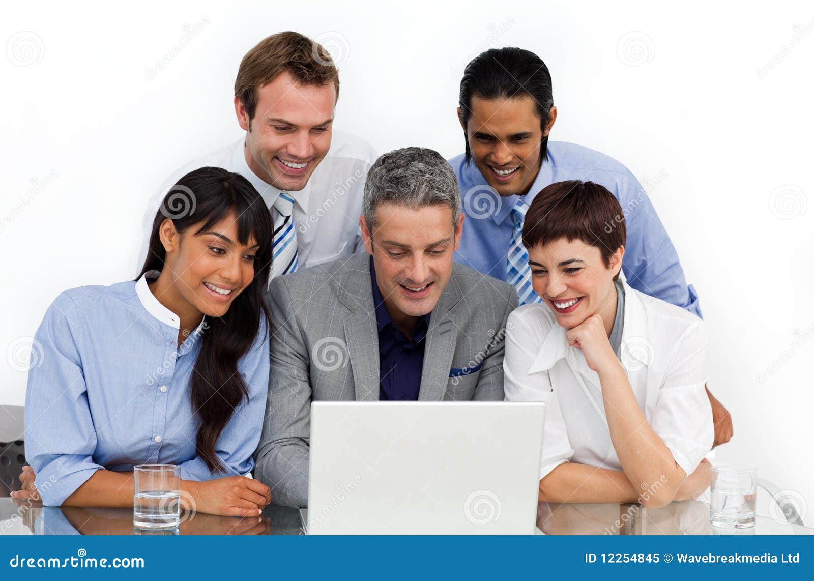 A Business Group Showing Diversity Using a Laptop Stock Image - Image ...
