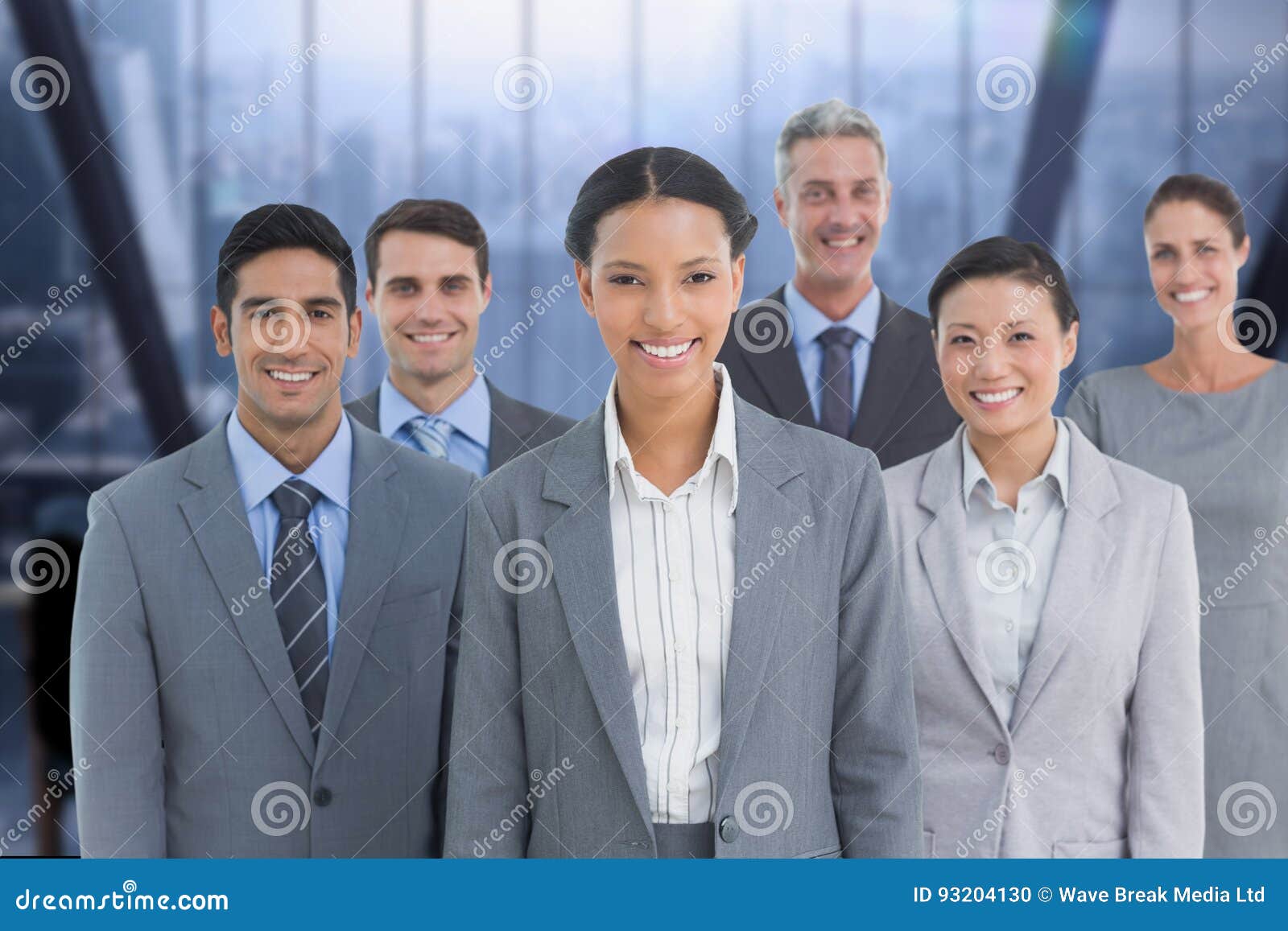 Business Group is Standing on Against Office Background Stock Photo ...