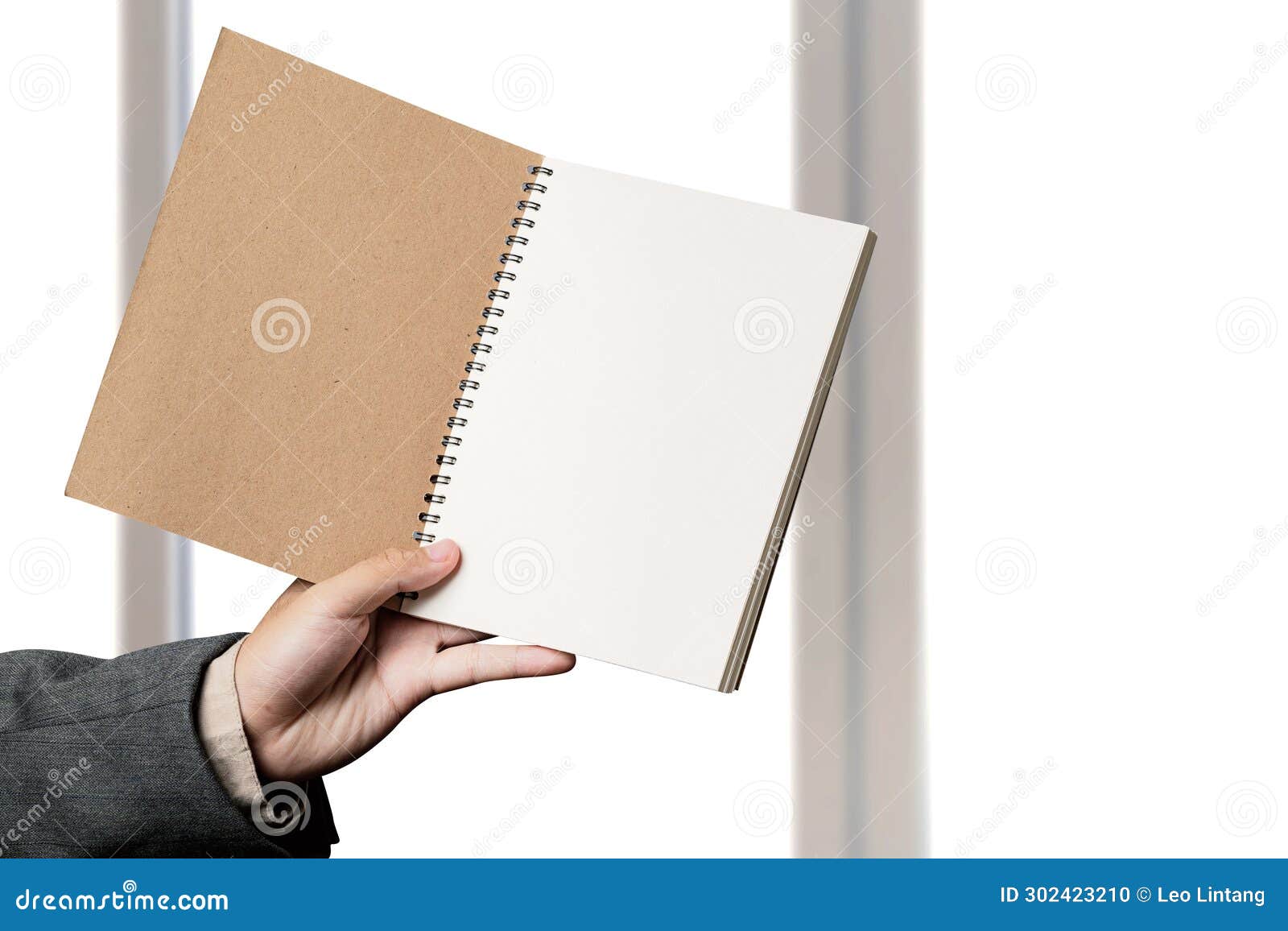A Business Hand Holding a Notebook Stock Photo - Image of empty ...
