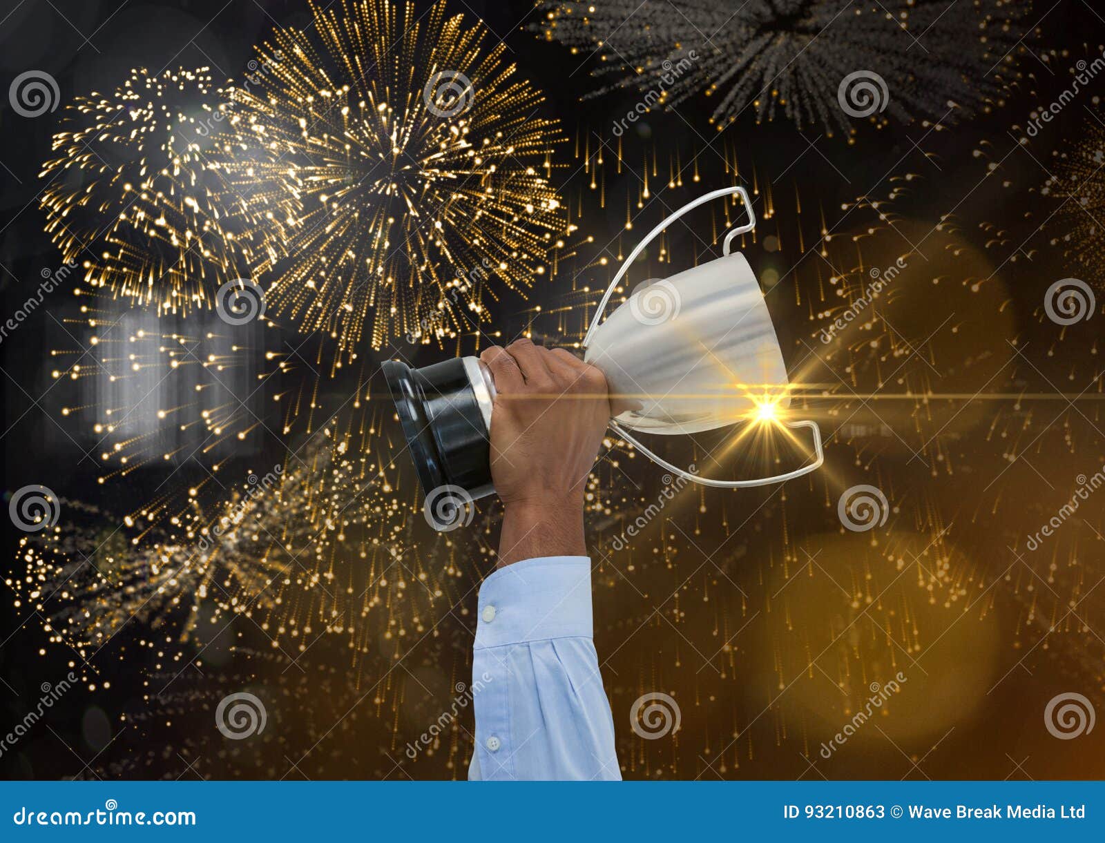 Business Hand with Trophy in a Gold Fireworks and Lights Stock ...