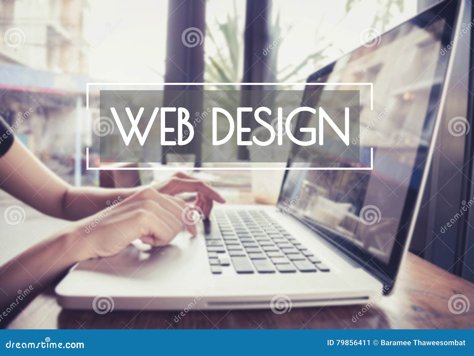 Business Hand Typing on a Laptop Keyboard with Web Design. Stock Image ...
