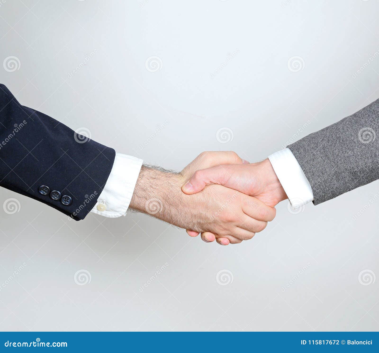 Suits Handshake stock photo. Image of handshake, suits - 115817672