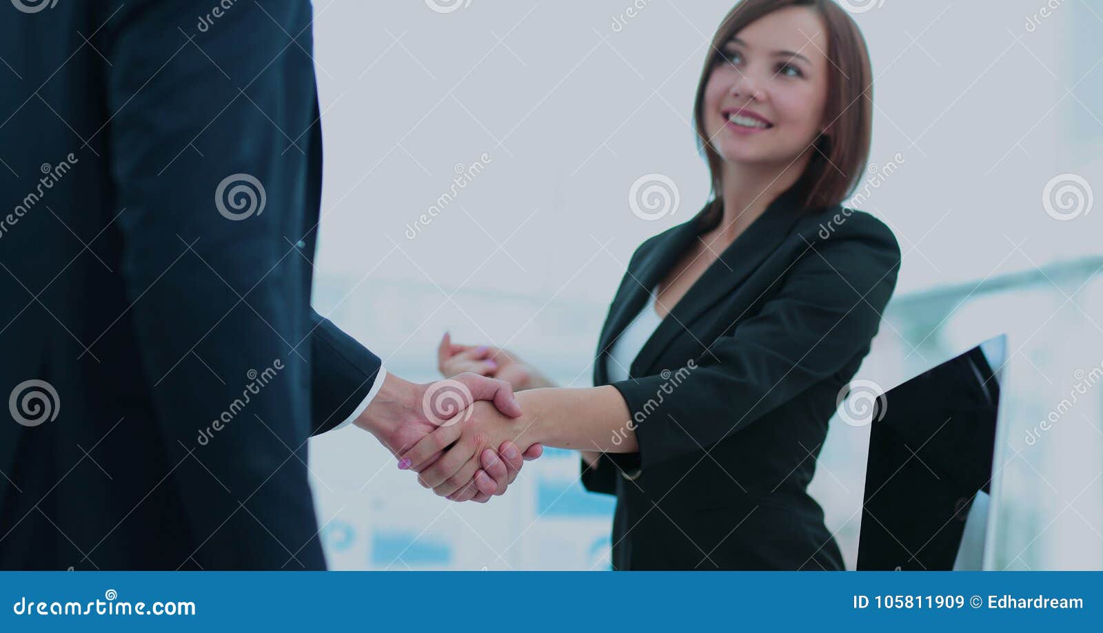 Two Business People Shaking Hands with Each Other in the Office Stock ...