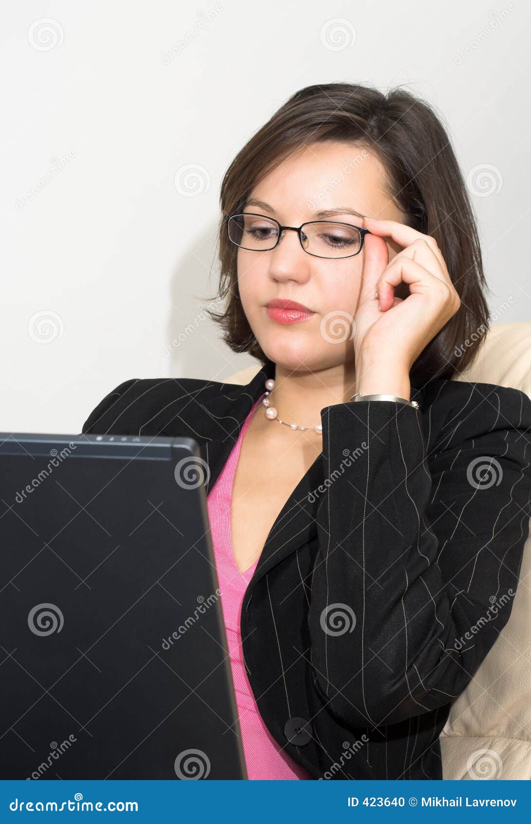 Business Lady with a Laptop Touching Her Glasses Stock Photo - Image of ...