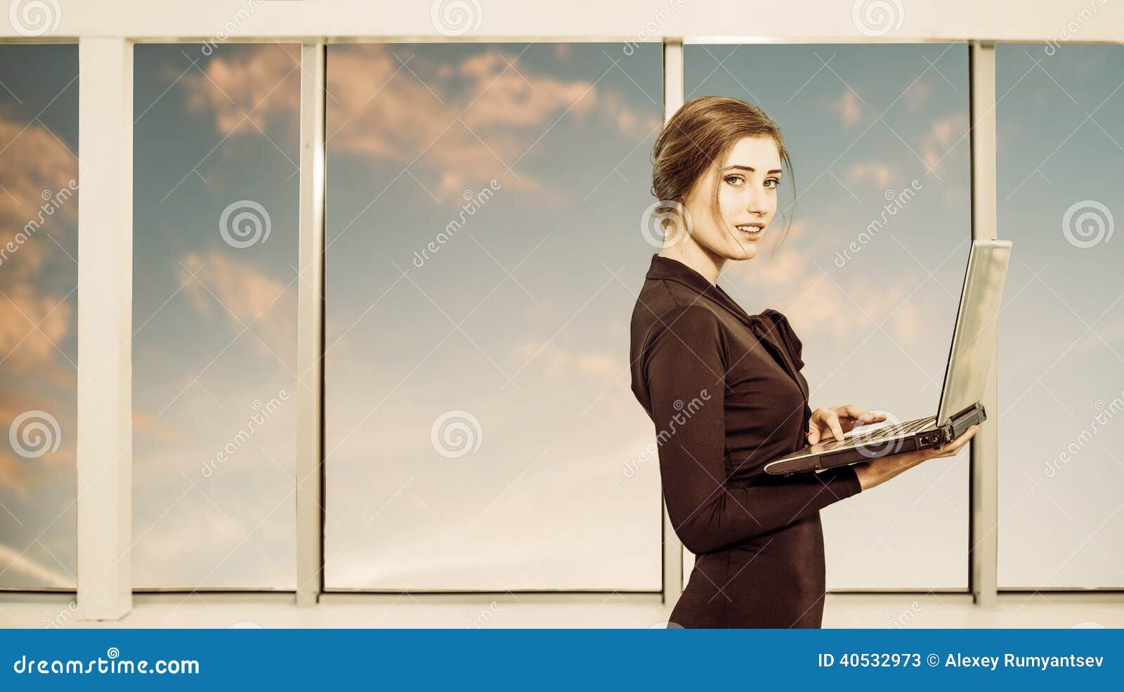 Business lady with laptop stock image. Image of sunset - 40532973
