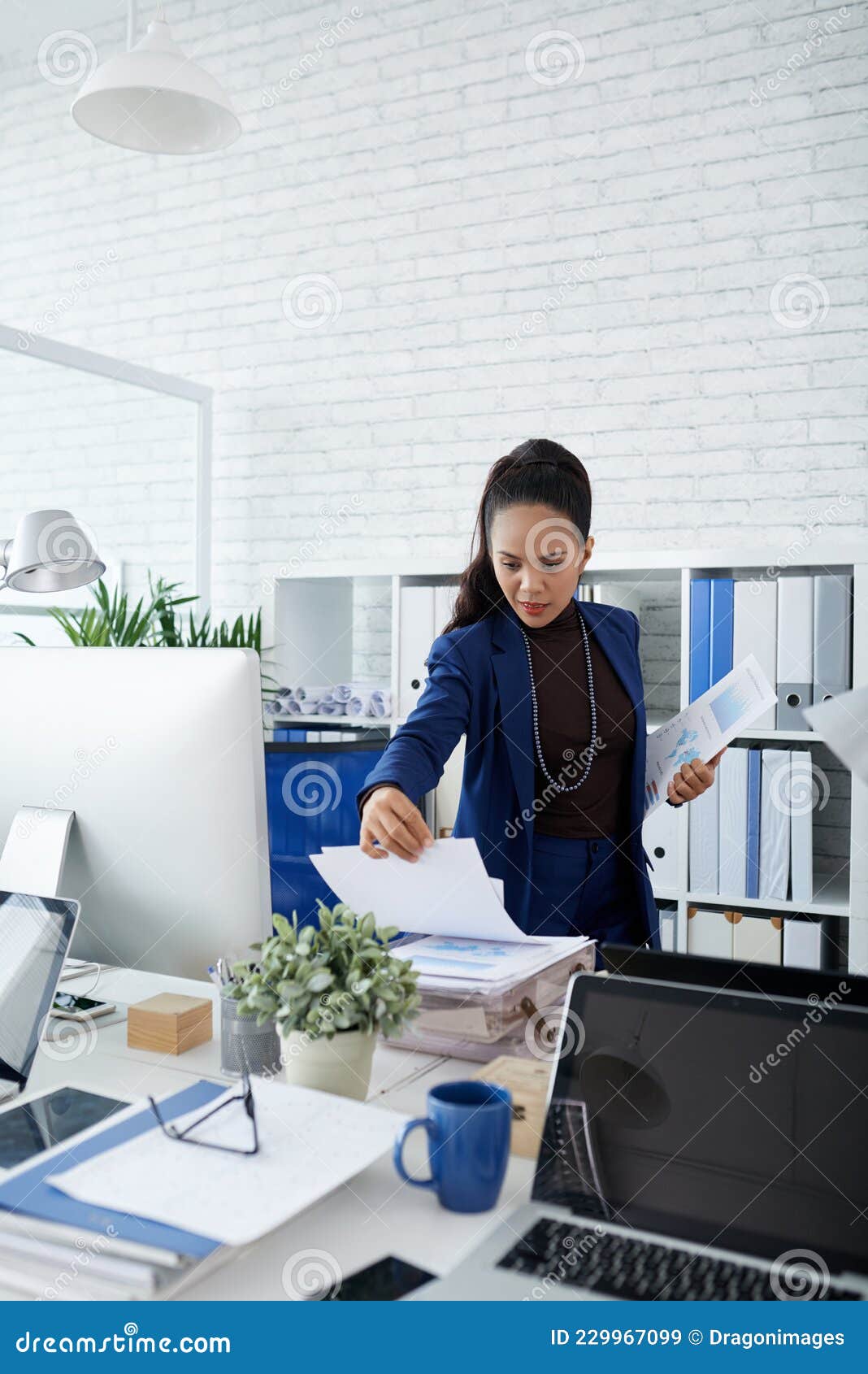 Business Lady Taking Documents Stock Image - Image of filipino, smiling ...