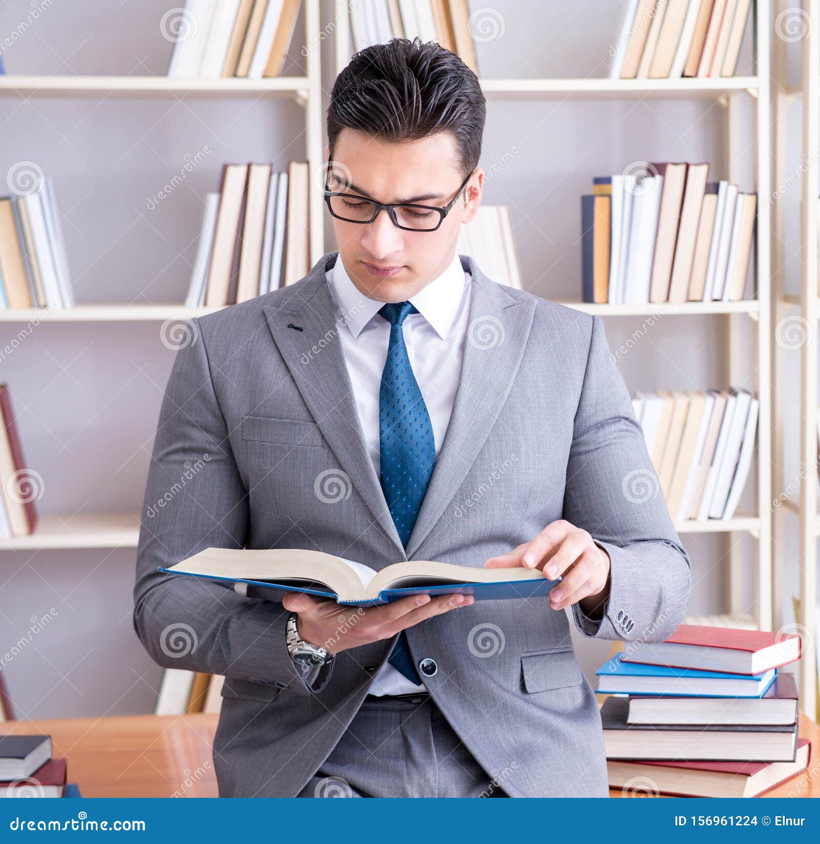 Business Law Student Working Studying in the Library Stock Photo ...