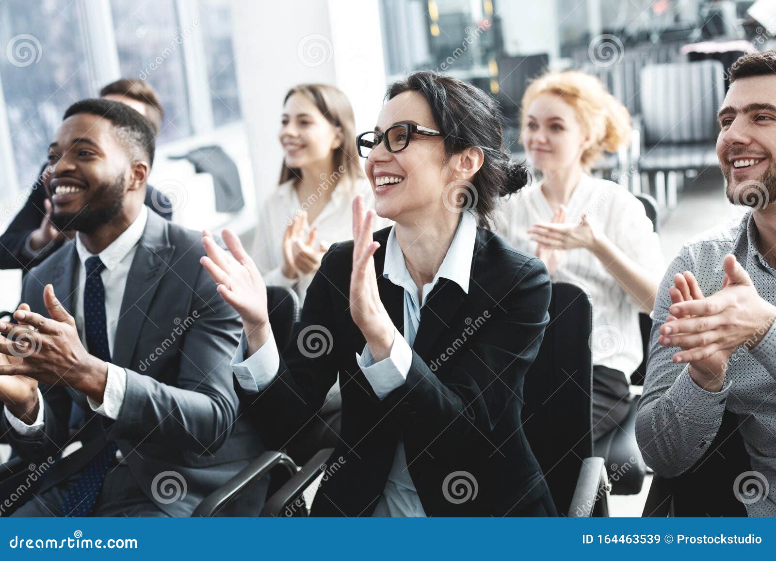 Business Lecture. Happy Executives Applauding To Speaker Stock Image ... Business Lecture. Happy Executives Applauding To Speaker Stock Image ...