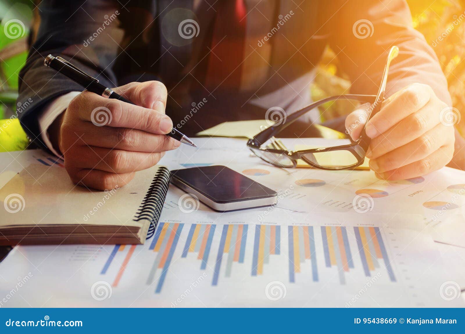 Business Man Analysis on Data Paper and Using Smartphone at the Stock ...