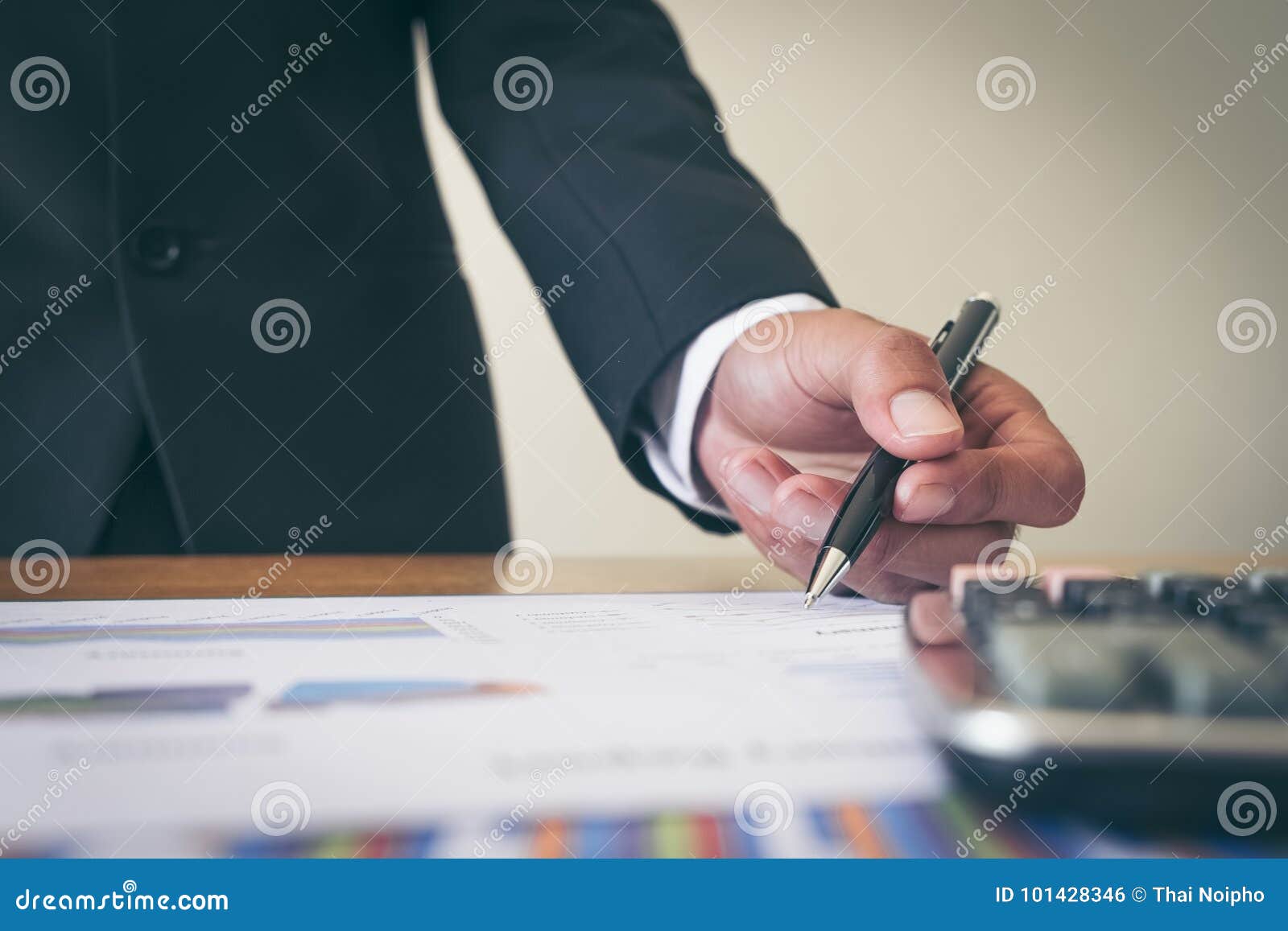 Business Man Analyzing Graph and Chart Document Report Stock Photo ...