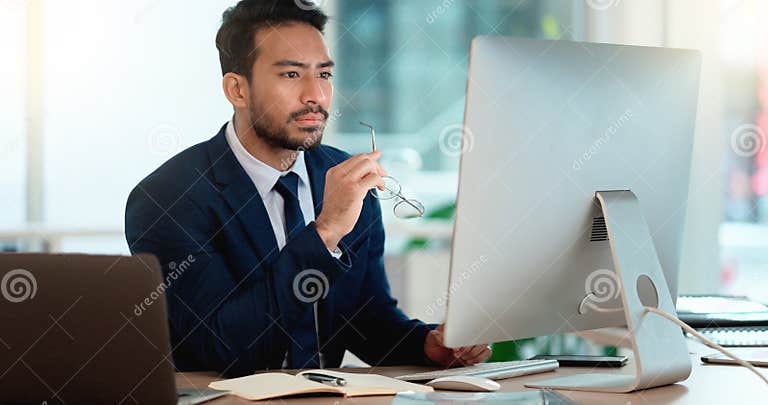 Business Man Analyzing a Project Strategy on a Computer Screen while ...