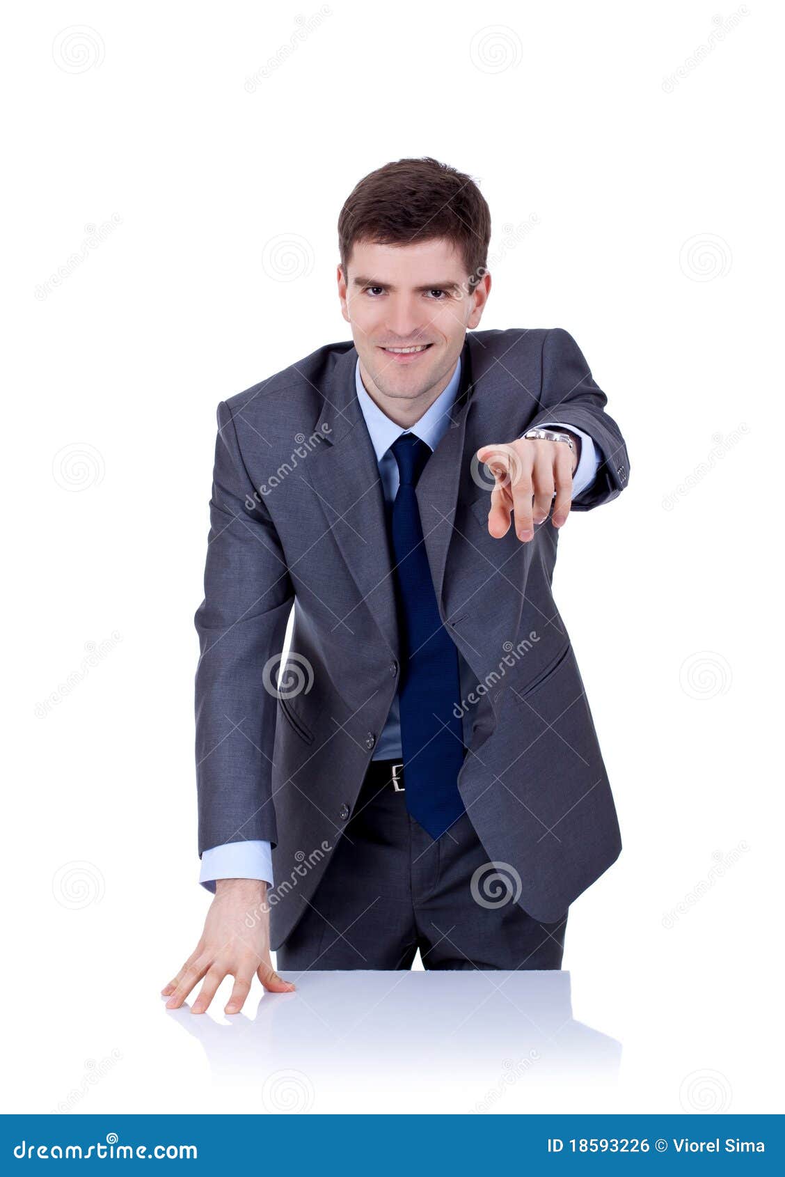 Business Man Behind the Desk Pointing Stock Photo - Image of portrait ...