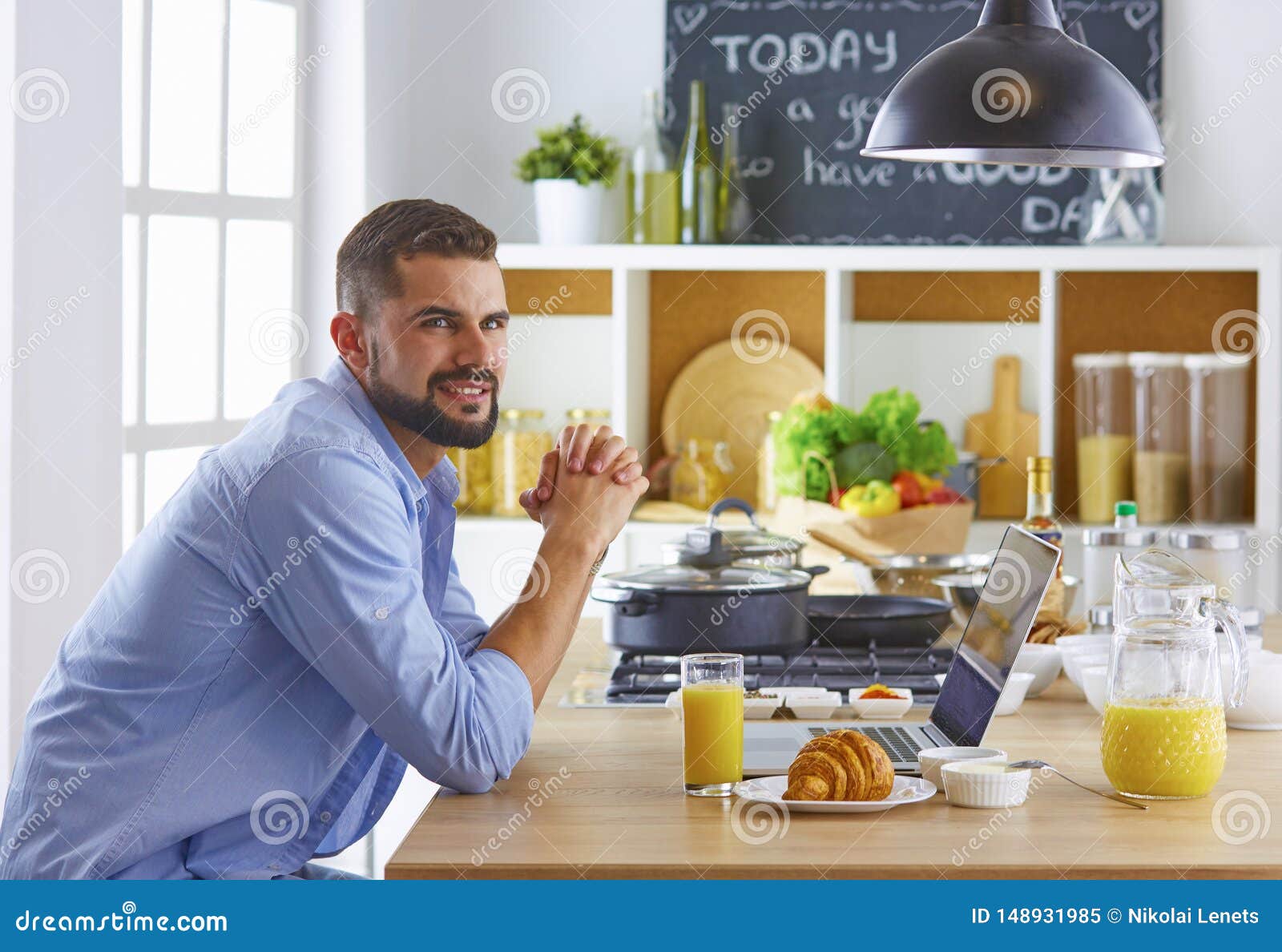 A Business Man Breakfasts with Notebook and Juice Stock Image - Image ...