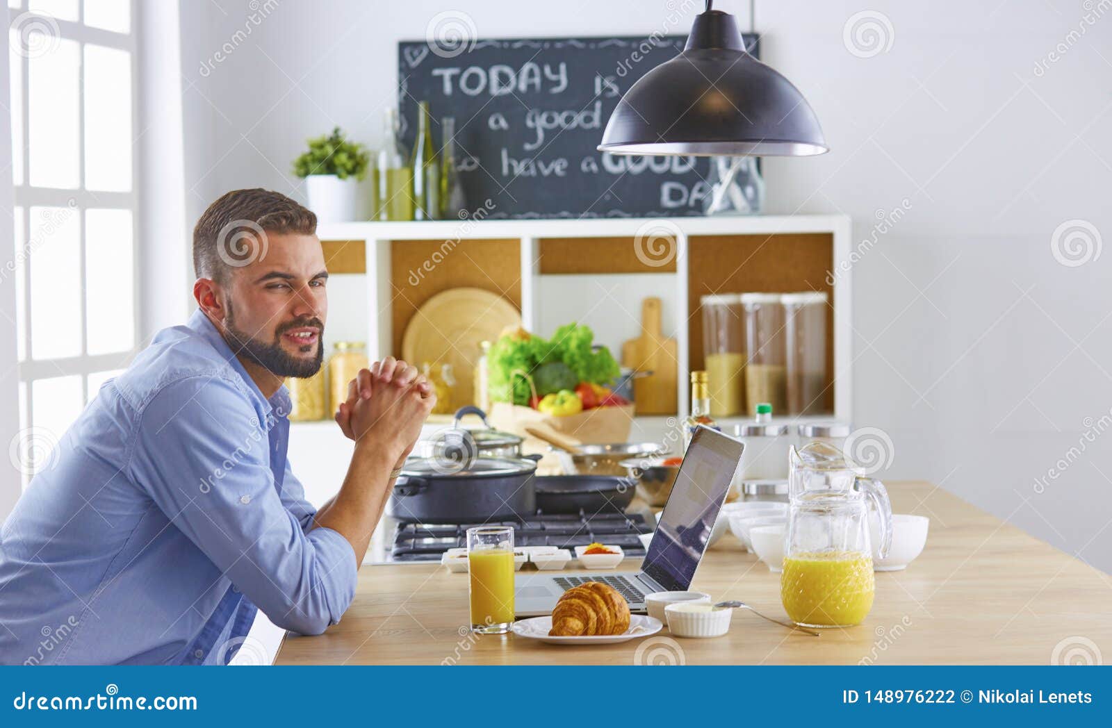 A Business Man Breakfasts with Notebook and Juice Stock Photo - Image ...