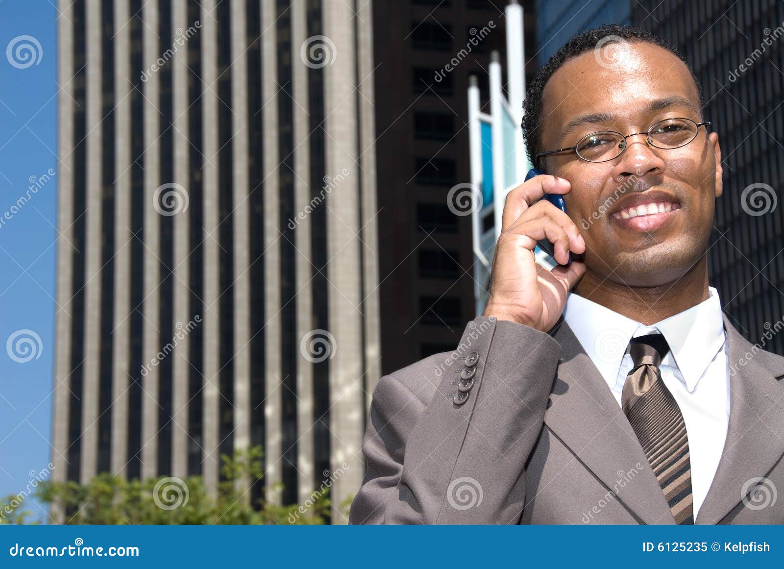 Business man on cell phone stock image. Image of black - 6125235