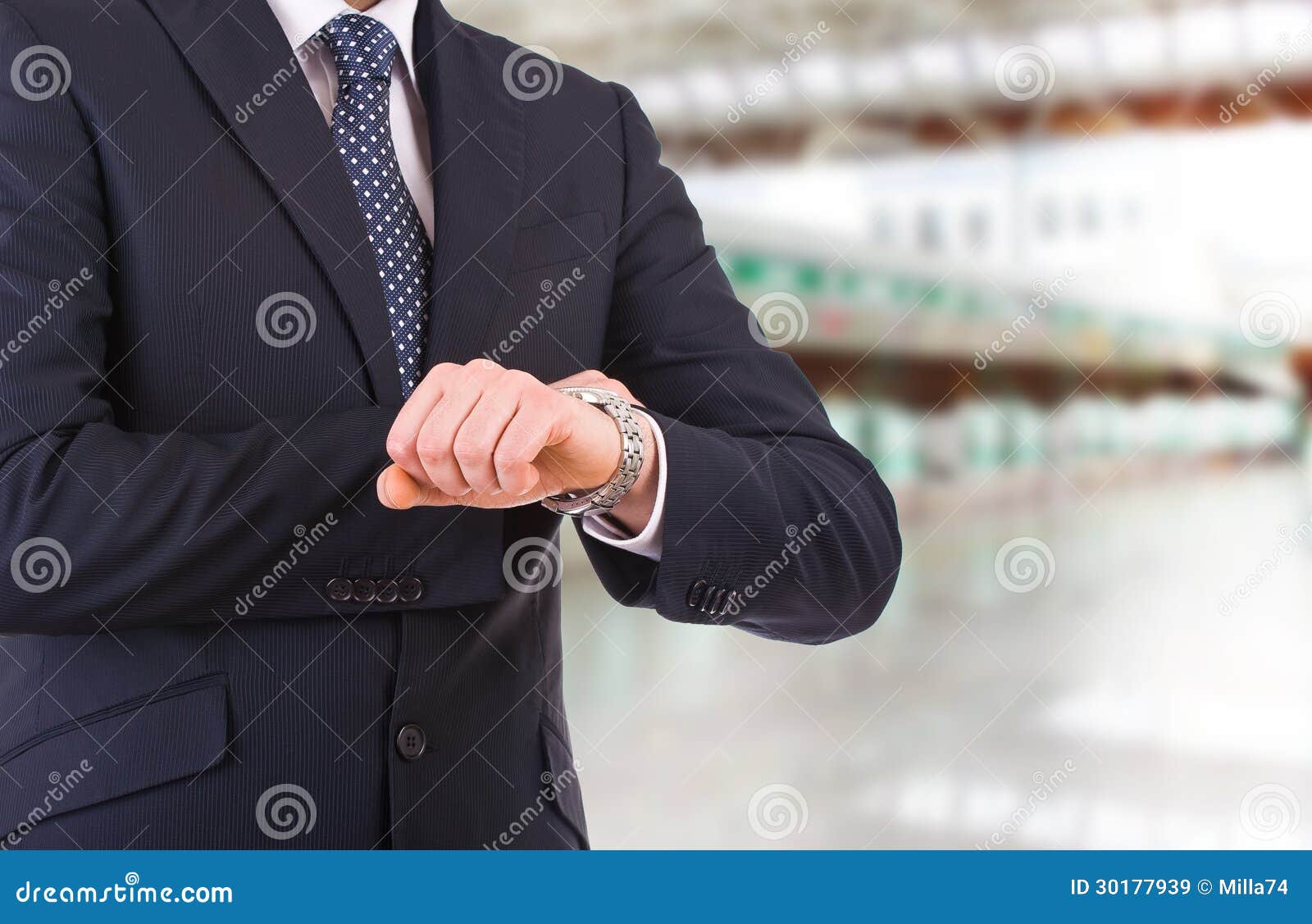 Businessman Checking Time on His Wristwatch. Stock Image - Image of ...