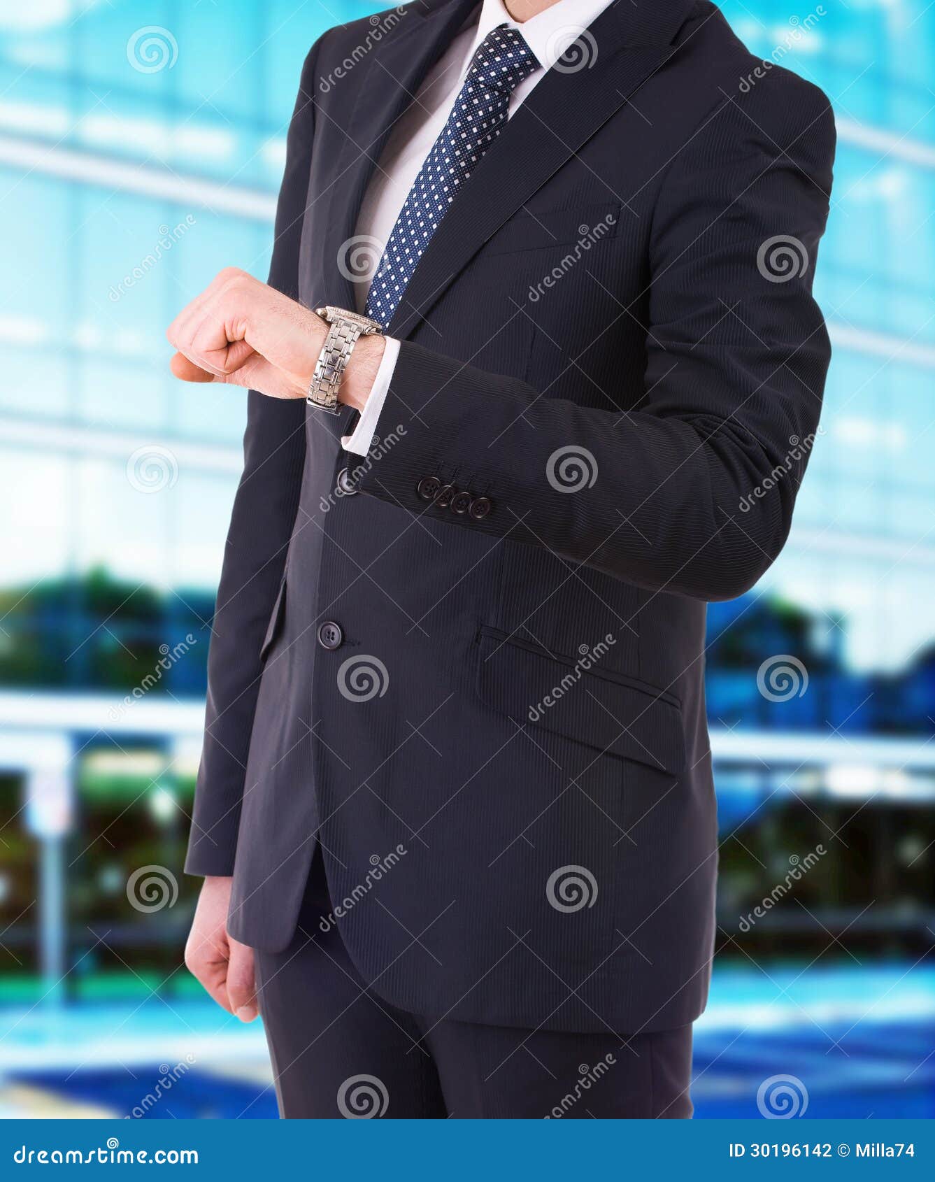 Businessman Checking Time on His Wristwatch. Stock Photo - Image of ...