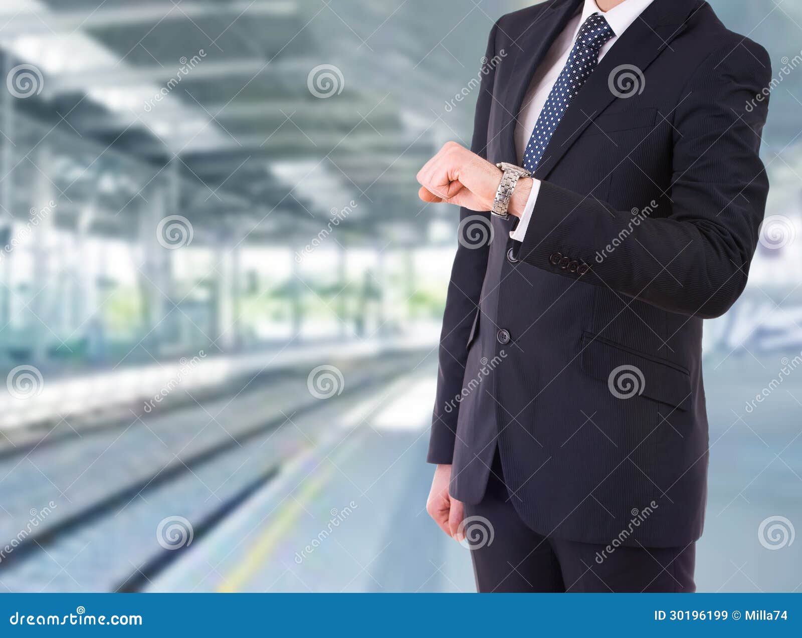 Businessman Checking Time on His Wristwatch. Stock Image - Image of ...