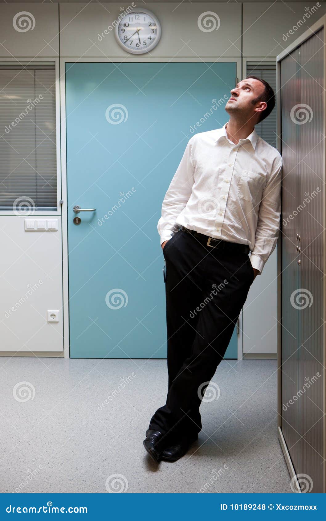 Business man and clock stock photo. Image of confident - 10189248