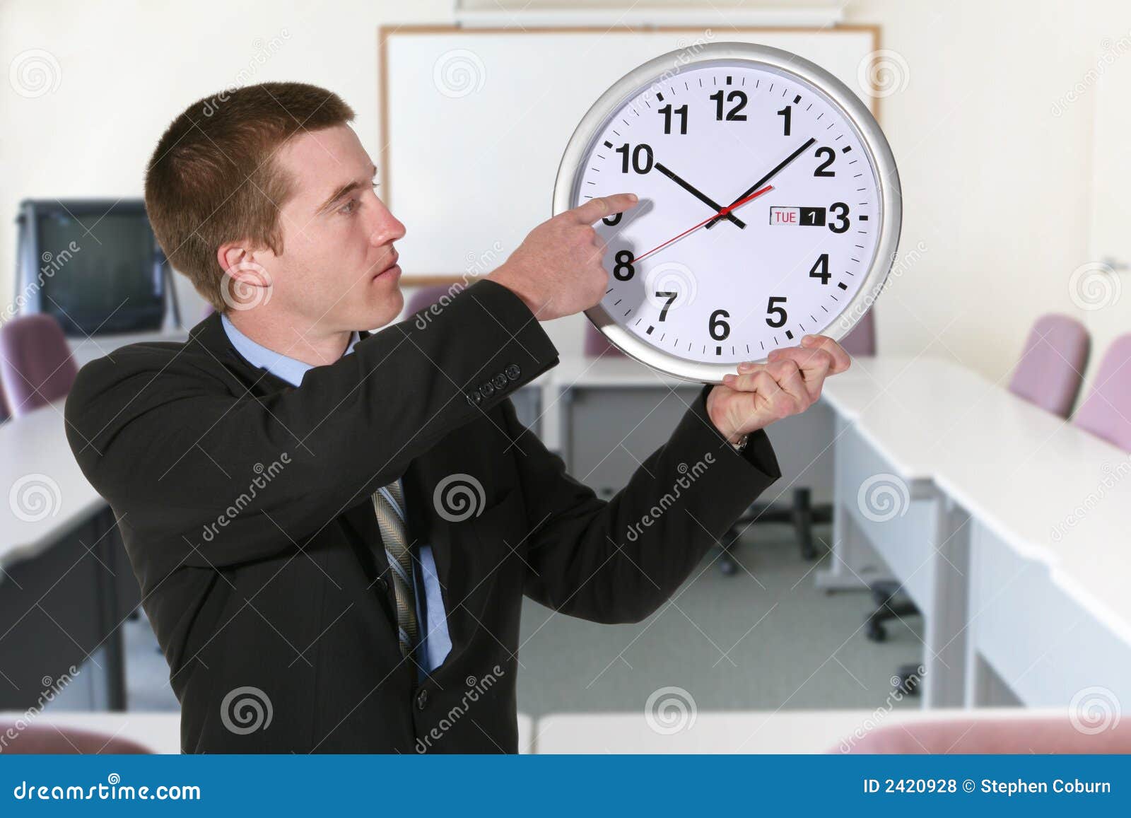Business Man and Clock stock photo. Image of hour, office - 2420928