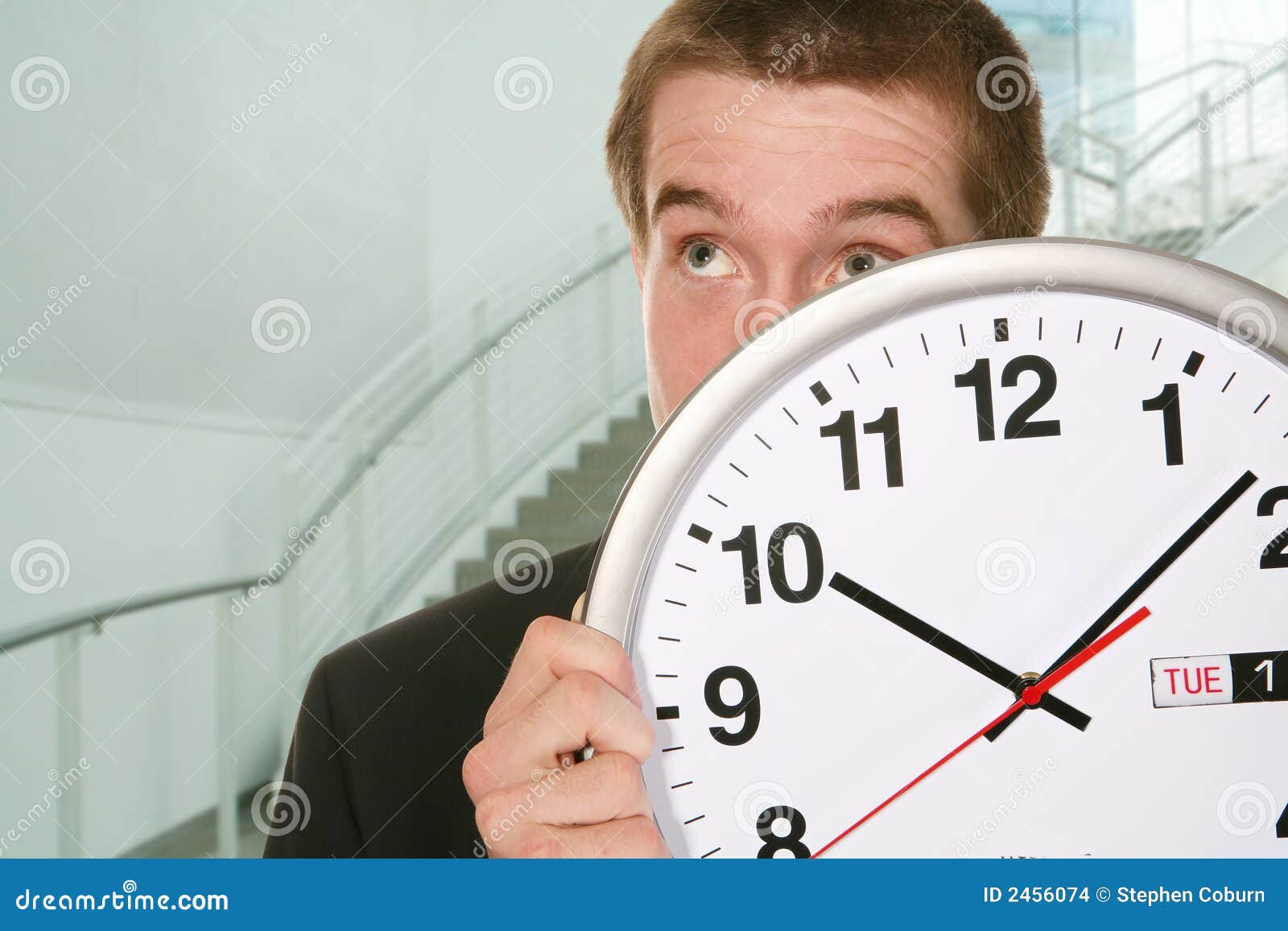 Business Man with Clock stock photo. Image of hour, inside - 2456074