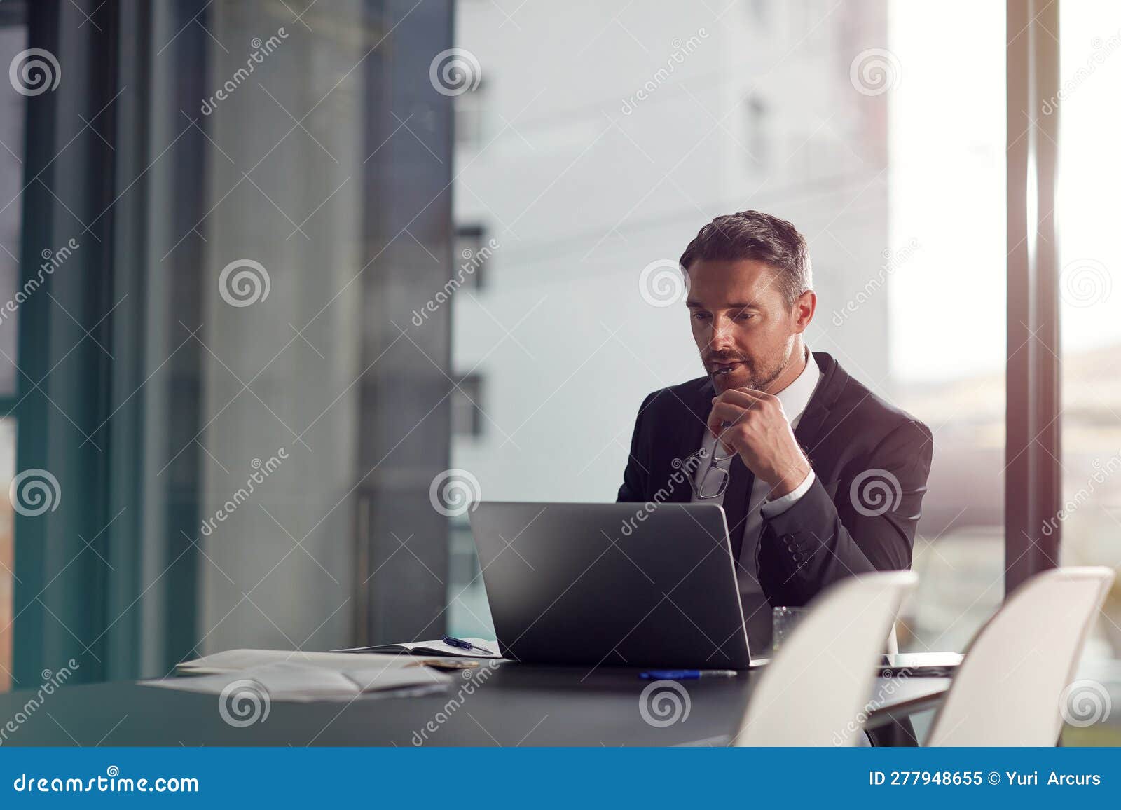 Business Man, Computer and Thinking, Reading and Online Management with ...