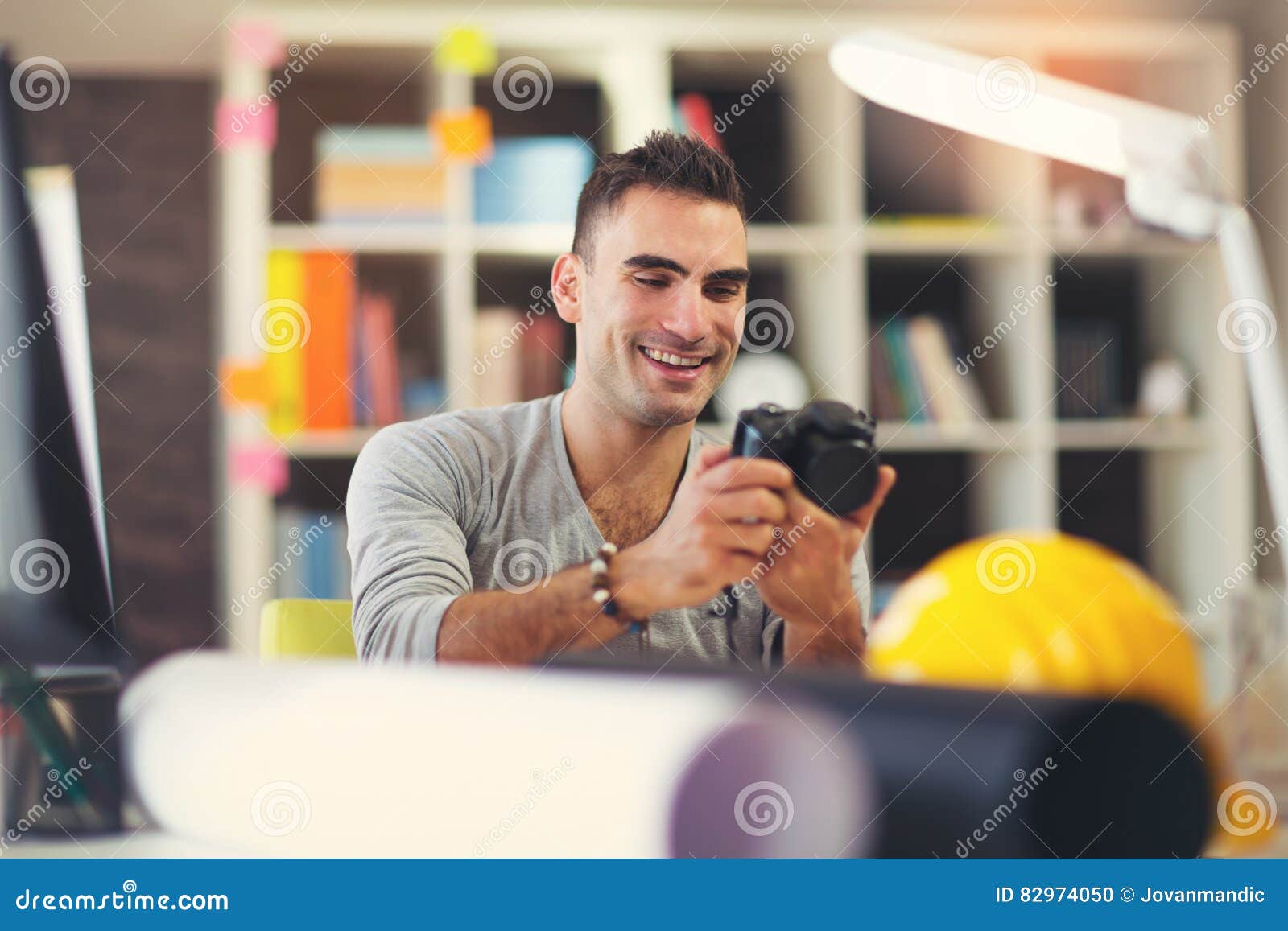 Business Man with Digital Camera at Office Desk Stock Photo - Image of ...