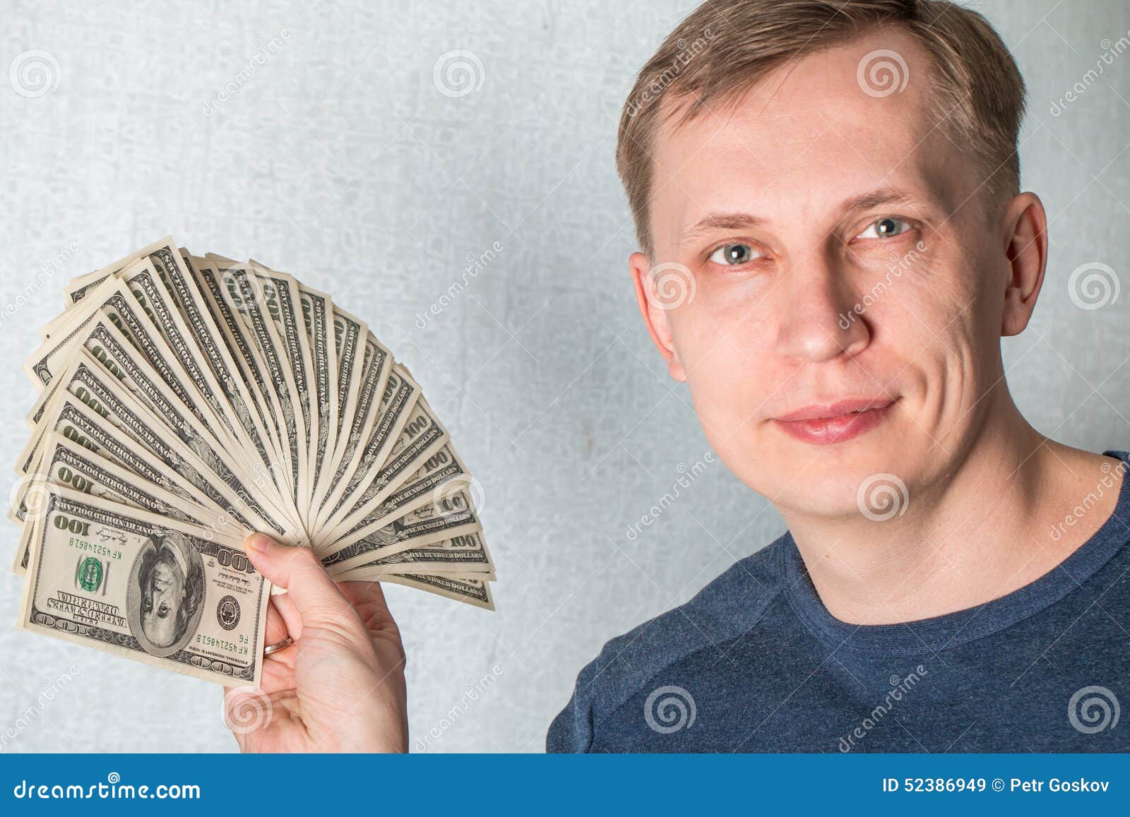 Business Man Displaying a Spread of Dollars Stock Image - Image of ...