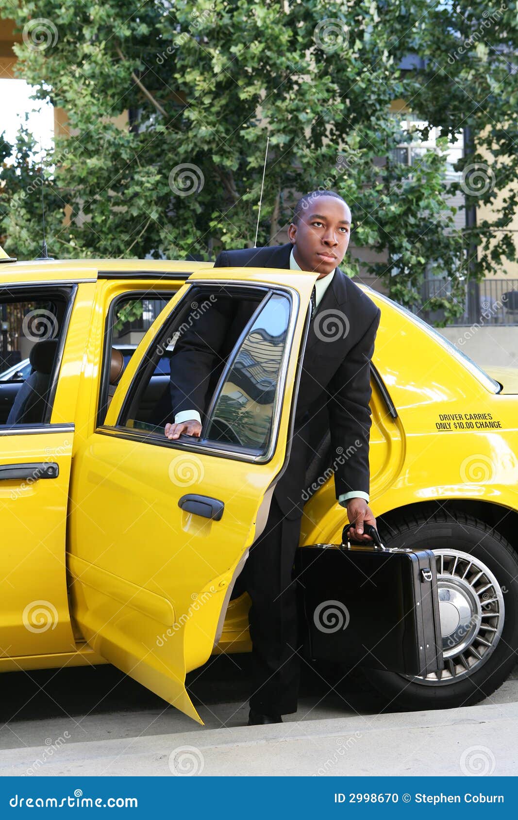 Business Man Exiting Taxi stock photo. Image of people - 2998670