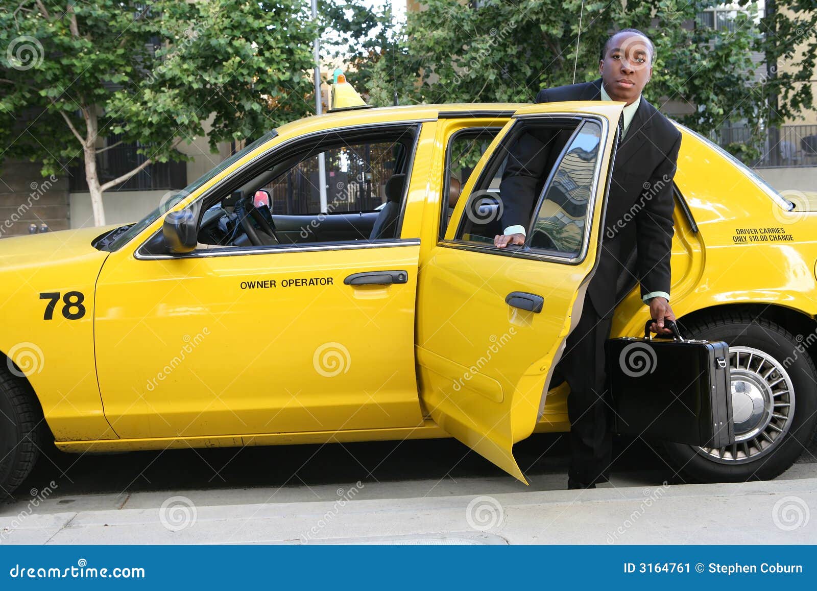 Business Man Exiting Taxi stock image. Image of black - 3164761
