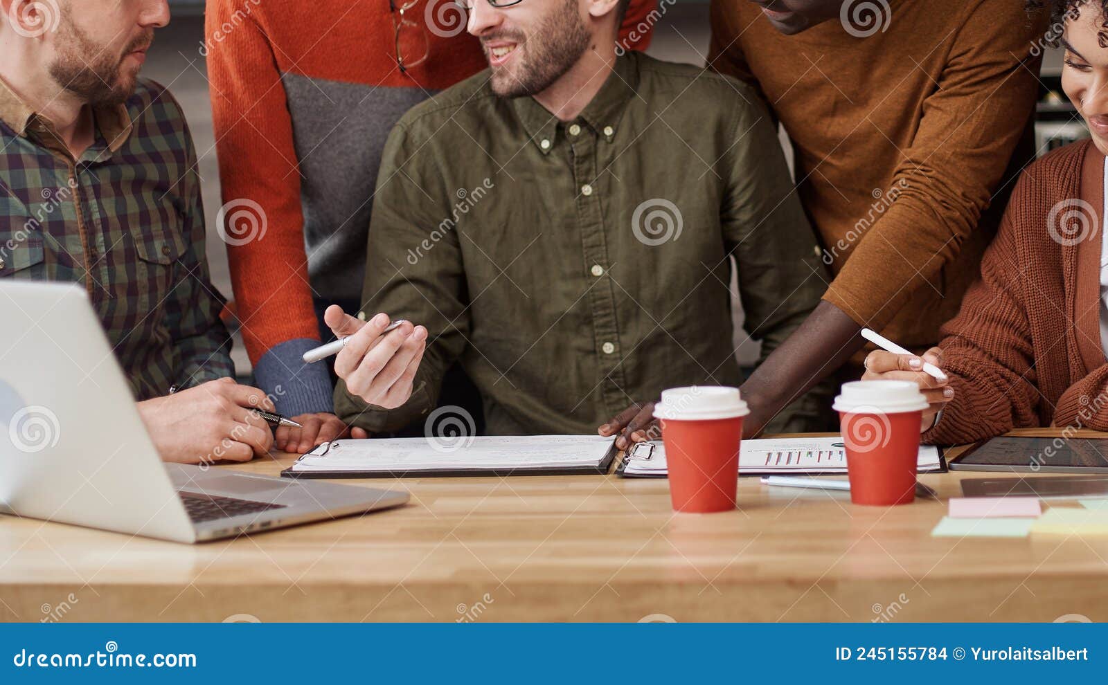 Business Man Explaining Something To His Colleagues . Stock Photo ...