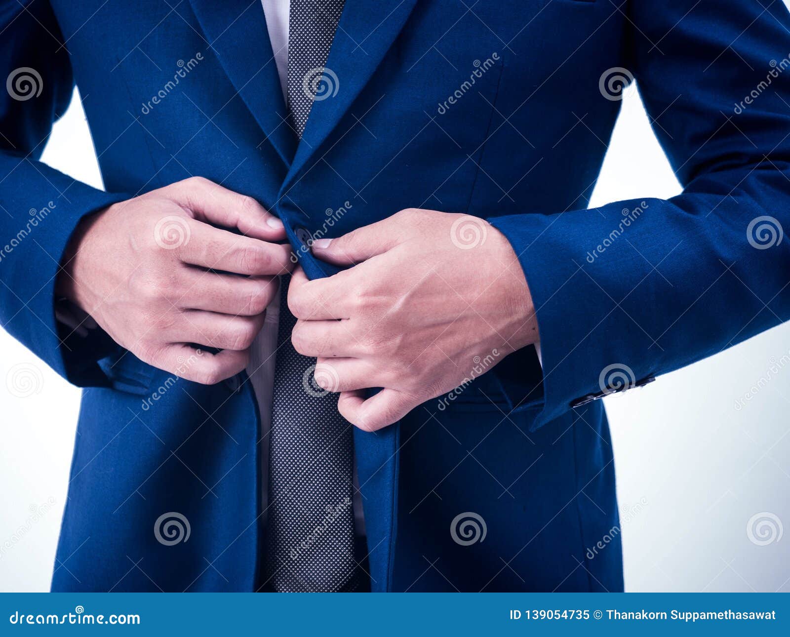 Business Man Fixing His Suit Stock Image - Image of person, adjusting ...