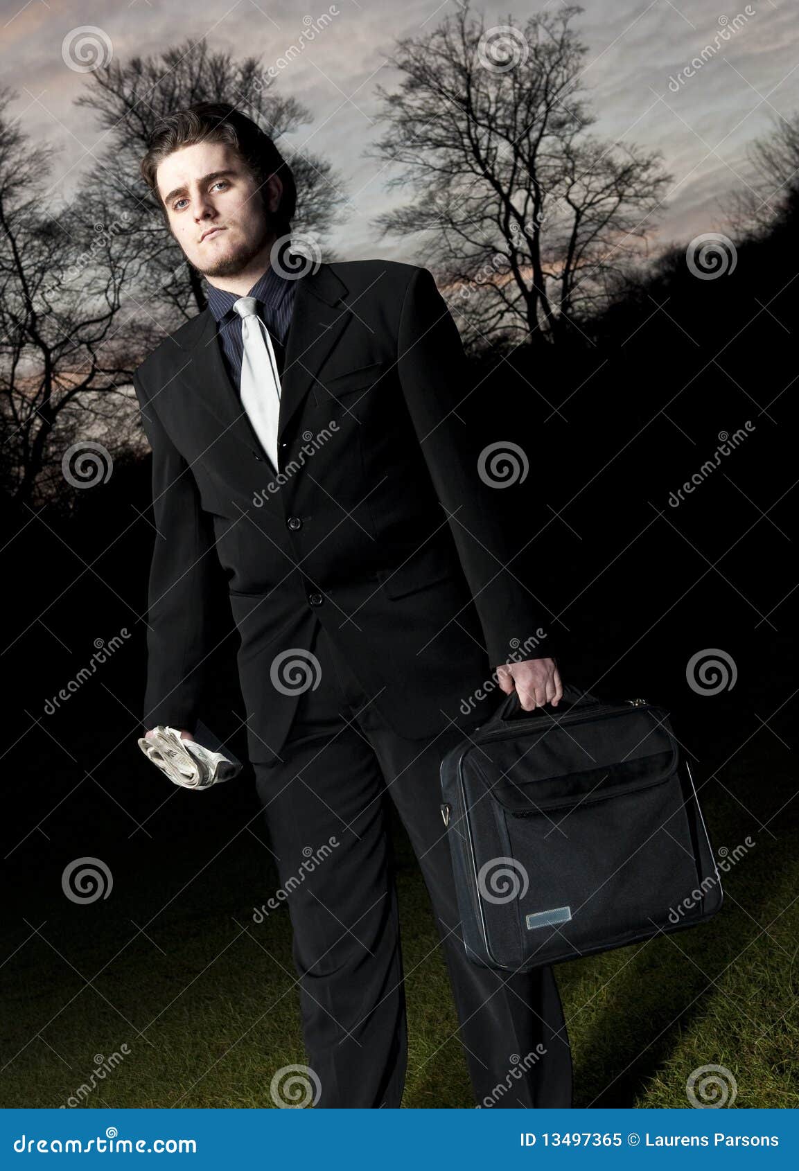 Business Man Gazing into Camera, Whilst Sunset. Stock Image - Image of ...