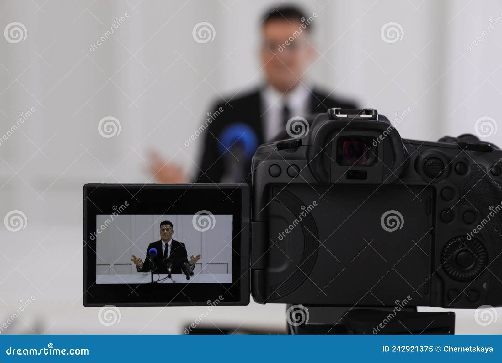 Business Man Giving Interview at Official Event, Focus on Video Camera ...