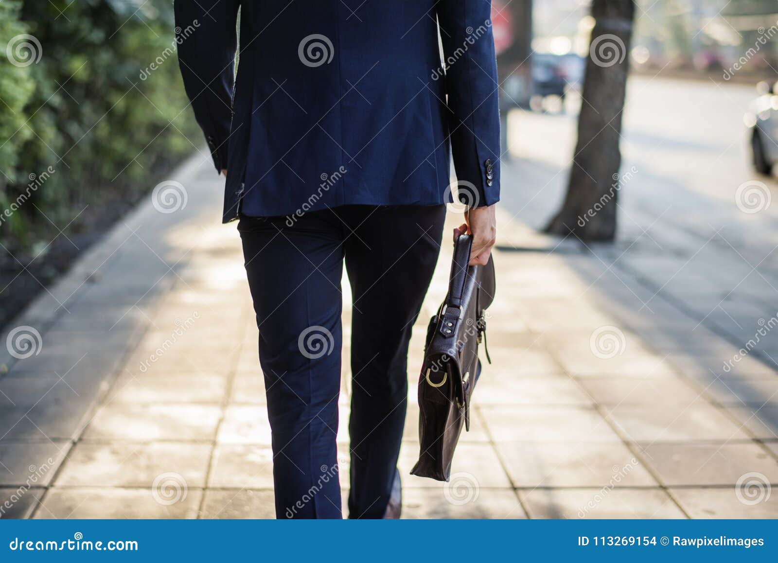 Business Man on the Go To Work Stock Photo - Image of gesture, holding ...